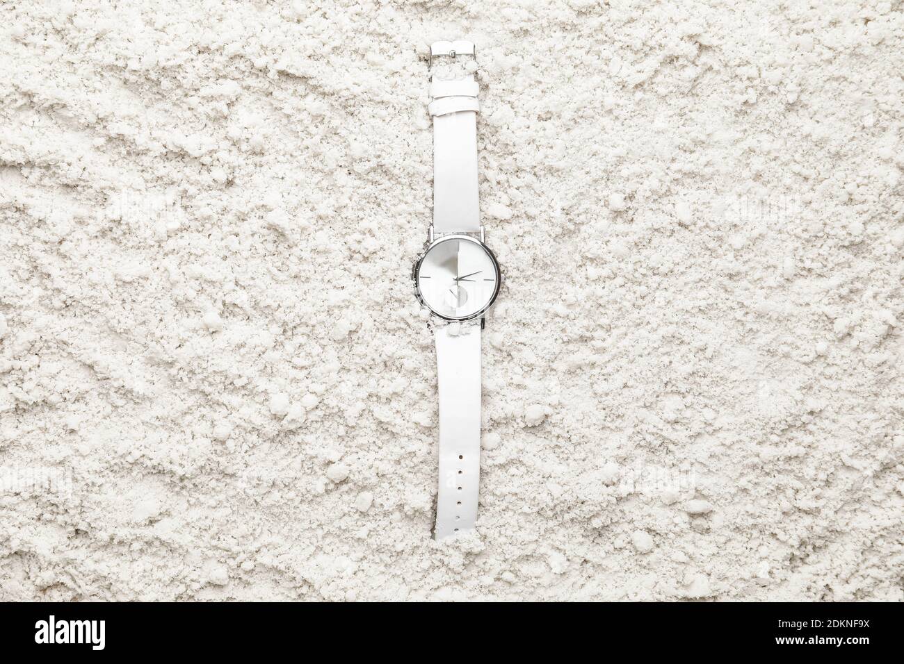 Wrist watch on beach sand Stock Photo - Alamy
