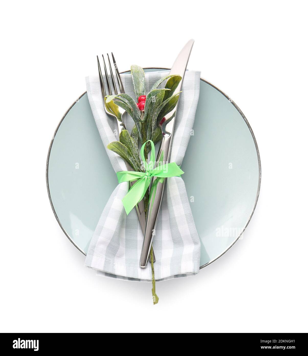 Beautiful Christmas table setting with mistletoe on white background ...