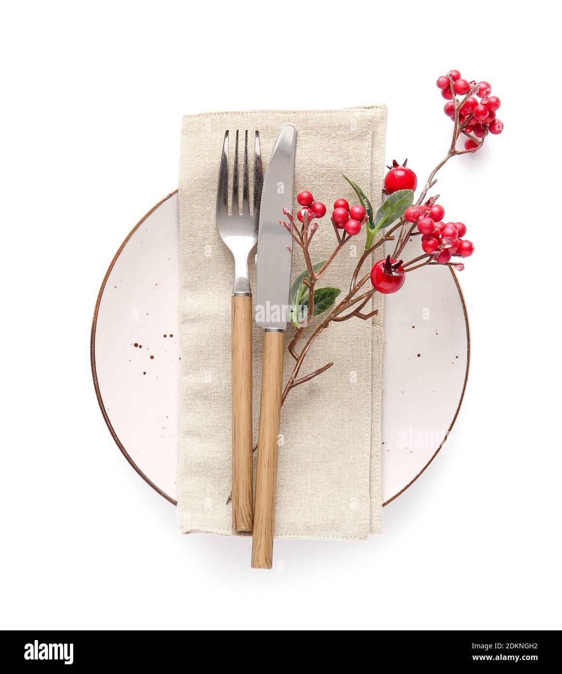 Beautiful Christmas table setting with mistletoe on white background ...
