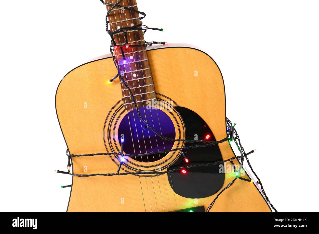 Guitar with Christmas lights on white background Stock Photo - Alamy