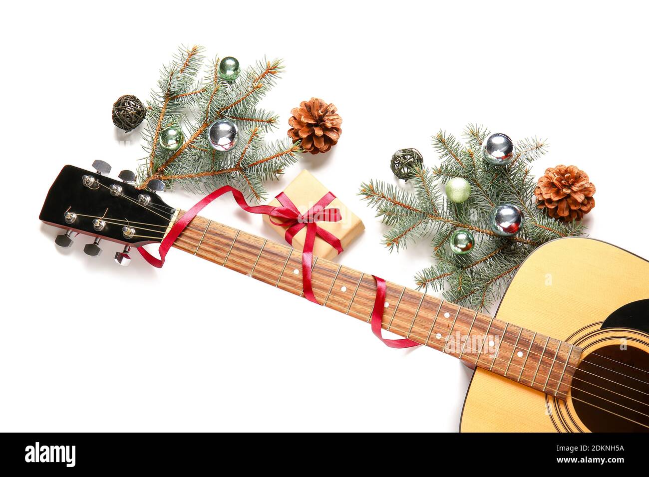 Guitar and Christmas decor on white background Stock Photo - Alamy
