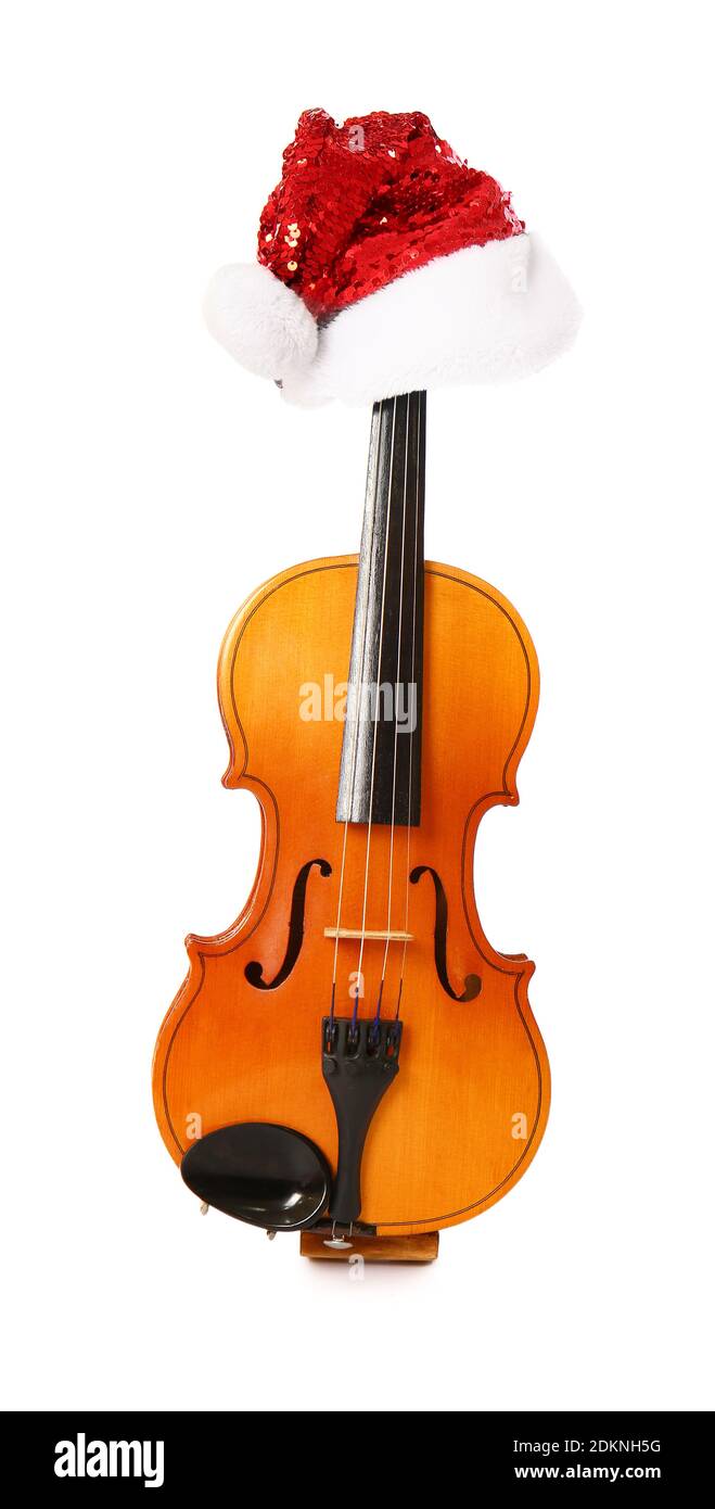 Violin with Santa Claus hat on white background Stock Photo - Alamy