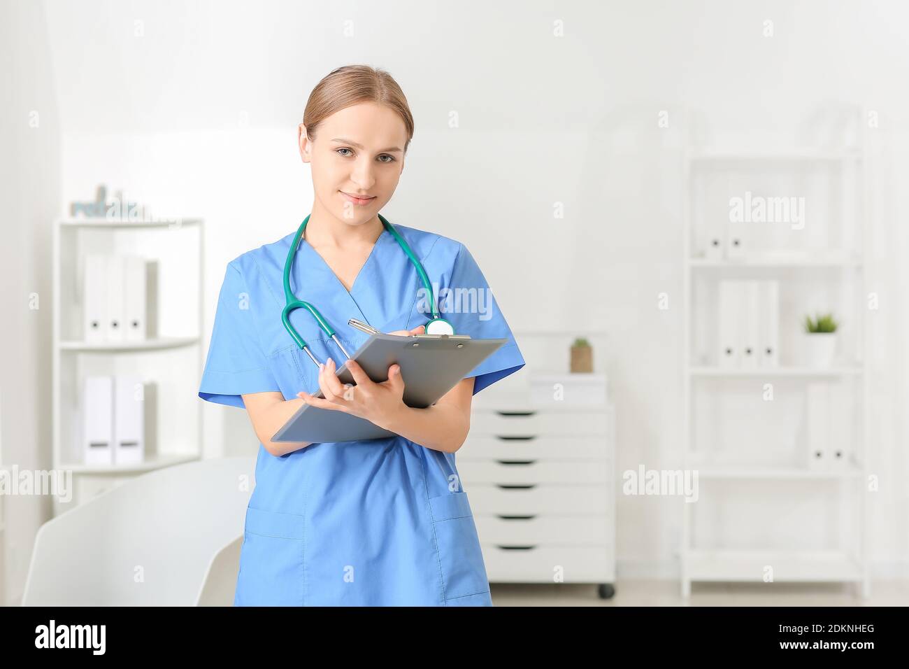 Beautiful young doctor working hi-res stock photography and images - Alamy