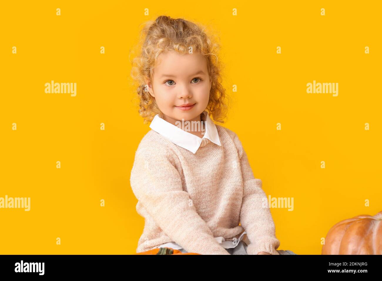 Cute little girl on color background Stock Photo - Alamy