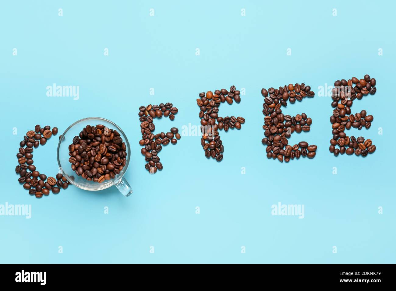 Cup of coffee and word COFFEE on color background Stock Photo - Alamy