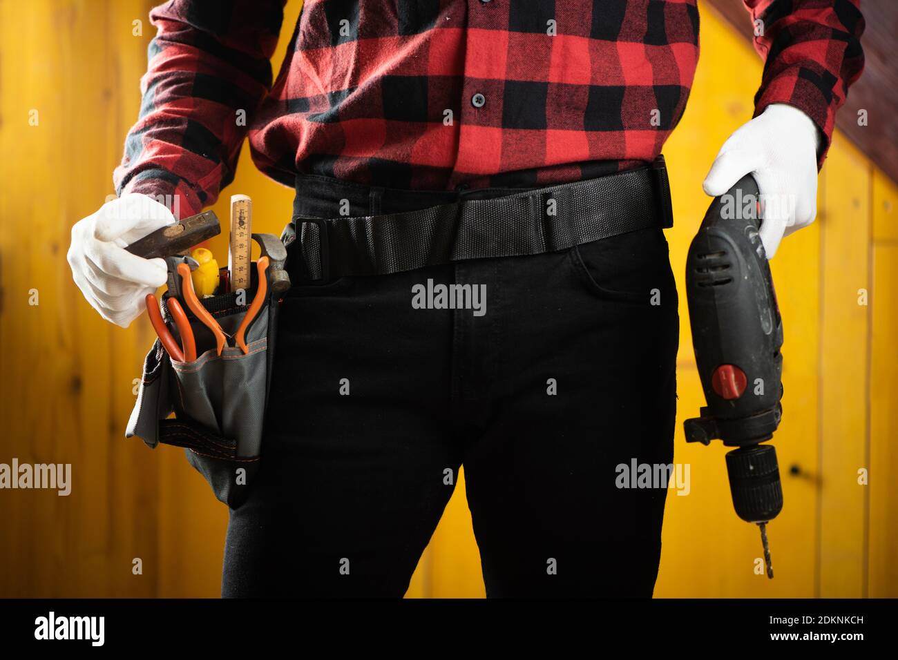 Builder handyman with construction tools. Close up Stock Photo - Alamy