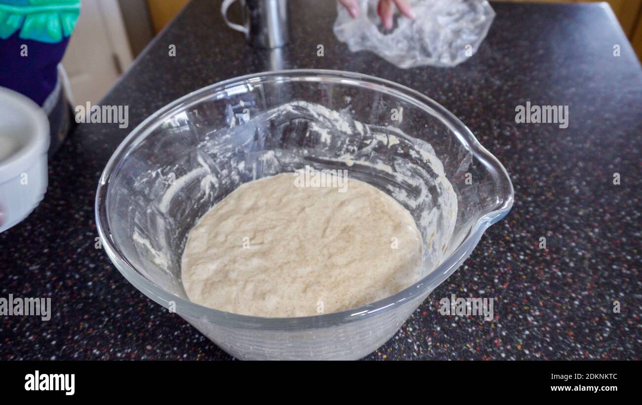 Step by step. Baking sourdough bread in residential kitchen Stock Photo ...