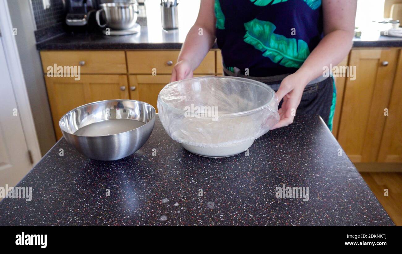 Step by step. Baking sourdough bread in residential kitchen Stock Photo ...