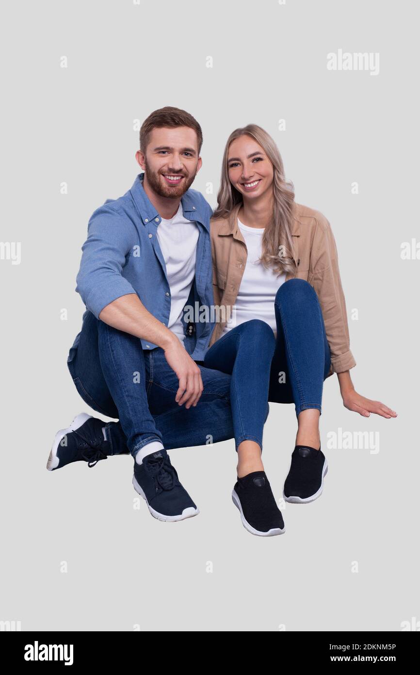 Couple Sitting on Floor Hugging. Couple Isolated Watching Front ...