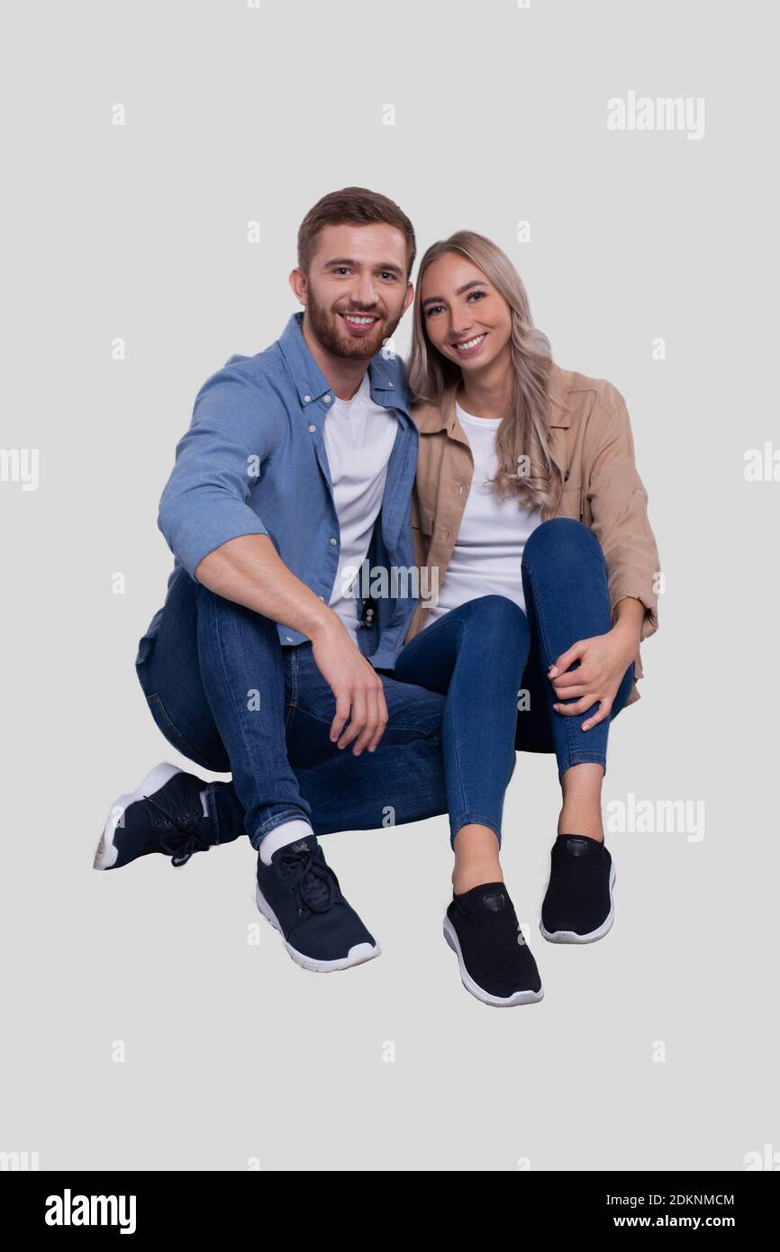 Couple Sitting on Floor Hugging. Couple Isolated Watching Front ...