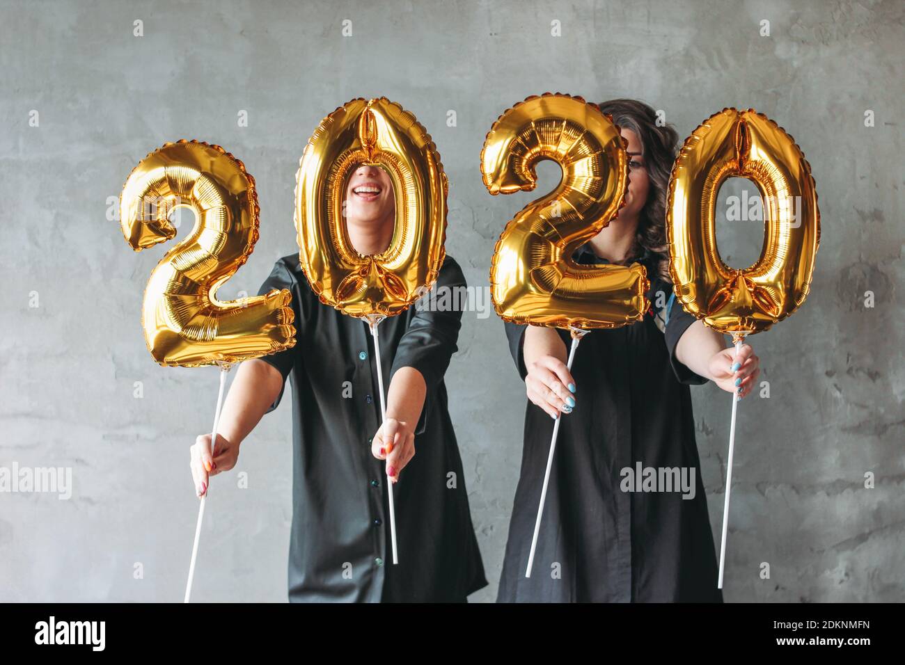 Women holding number balloons hi-res stock photography and images - Alamy