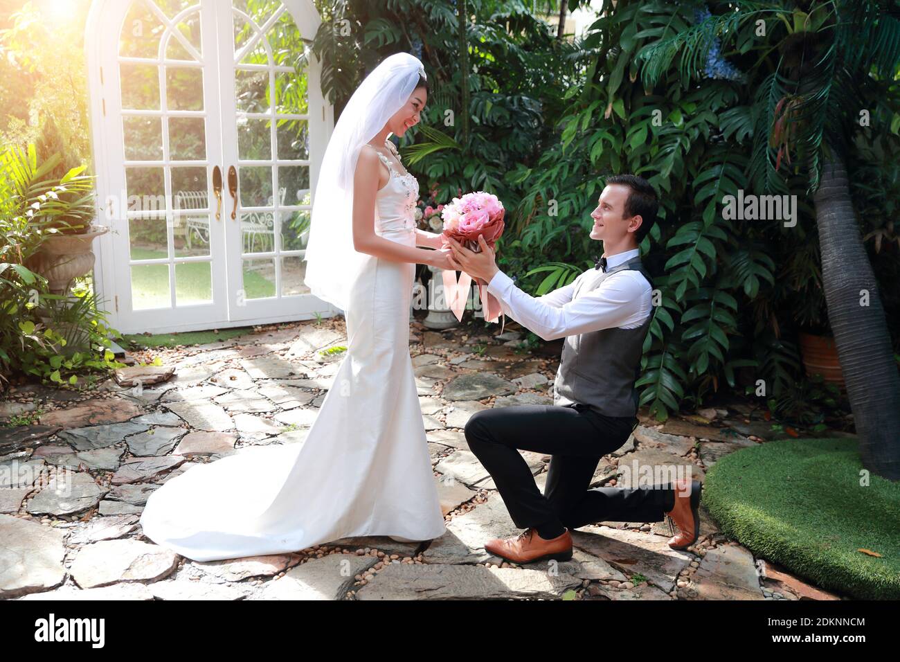 Kneeling Bride High Resolution Stock Photography and Images - Alamy