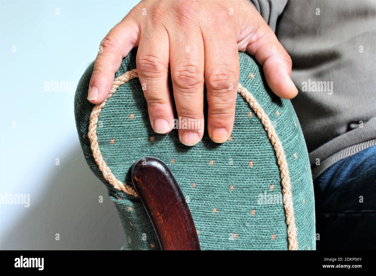 Woman sitting chair fingers hi-res stock photography and images - Alamy