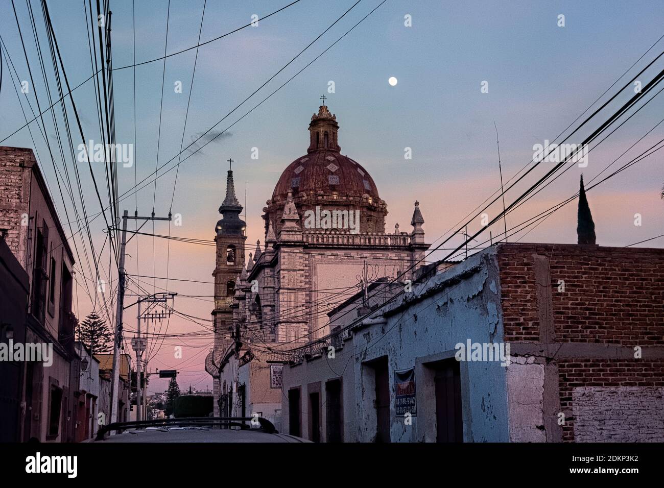 Church of Santa Rosa de Viterbo, wires, and full moon, Santiago de ...