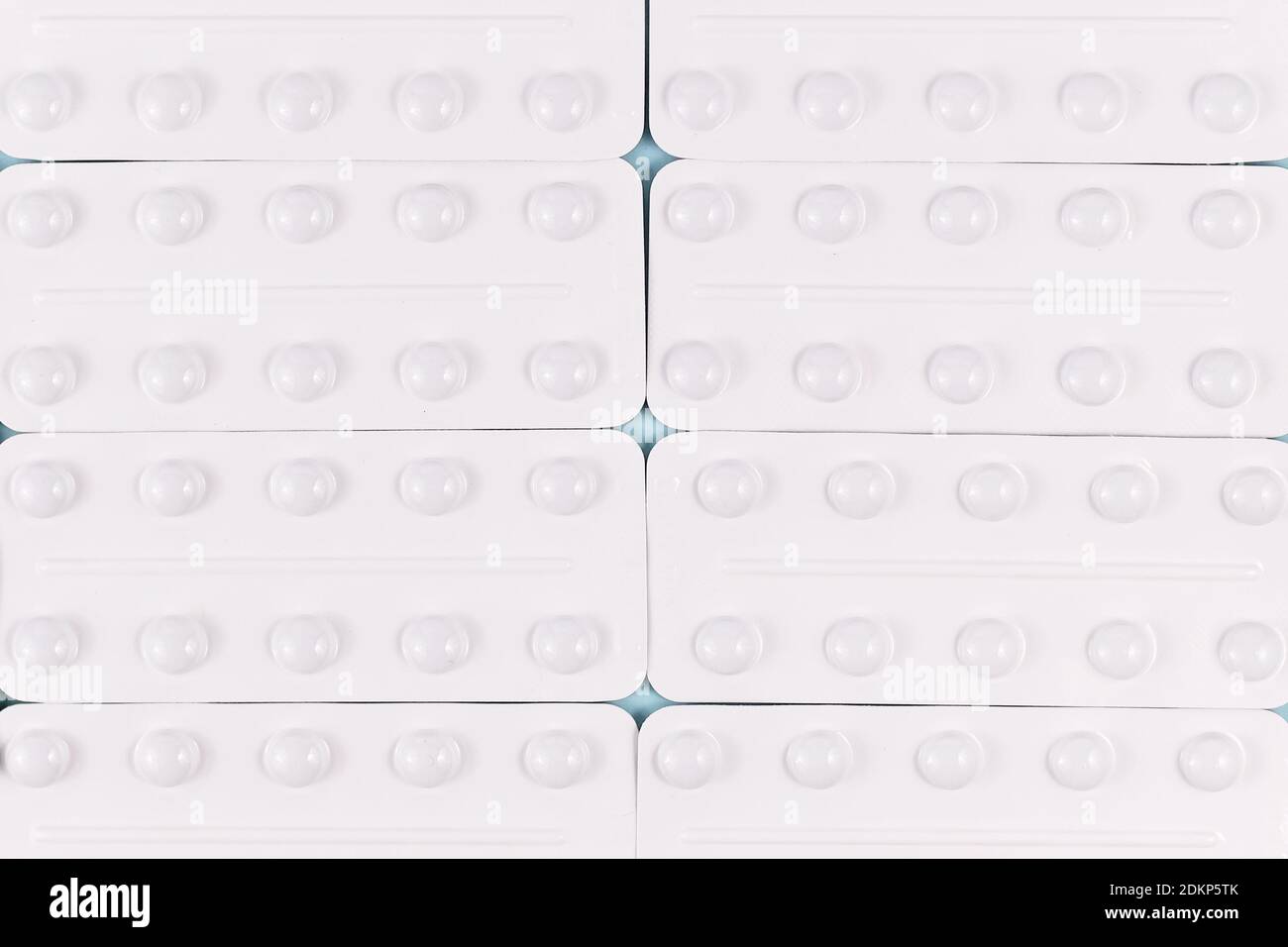 White pill blister packs aligned next to each other Stock Photo - Alamy