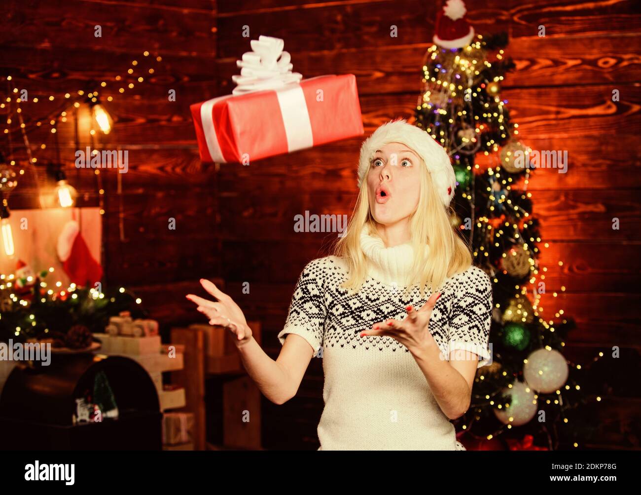 magic time. celebrate new year at home. happy woman love presents ...