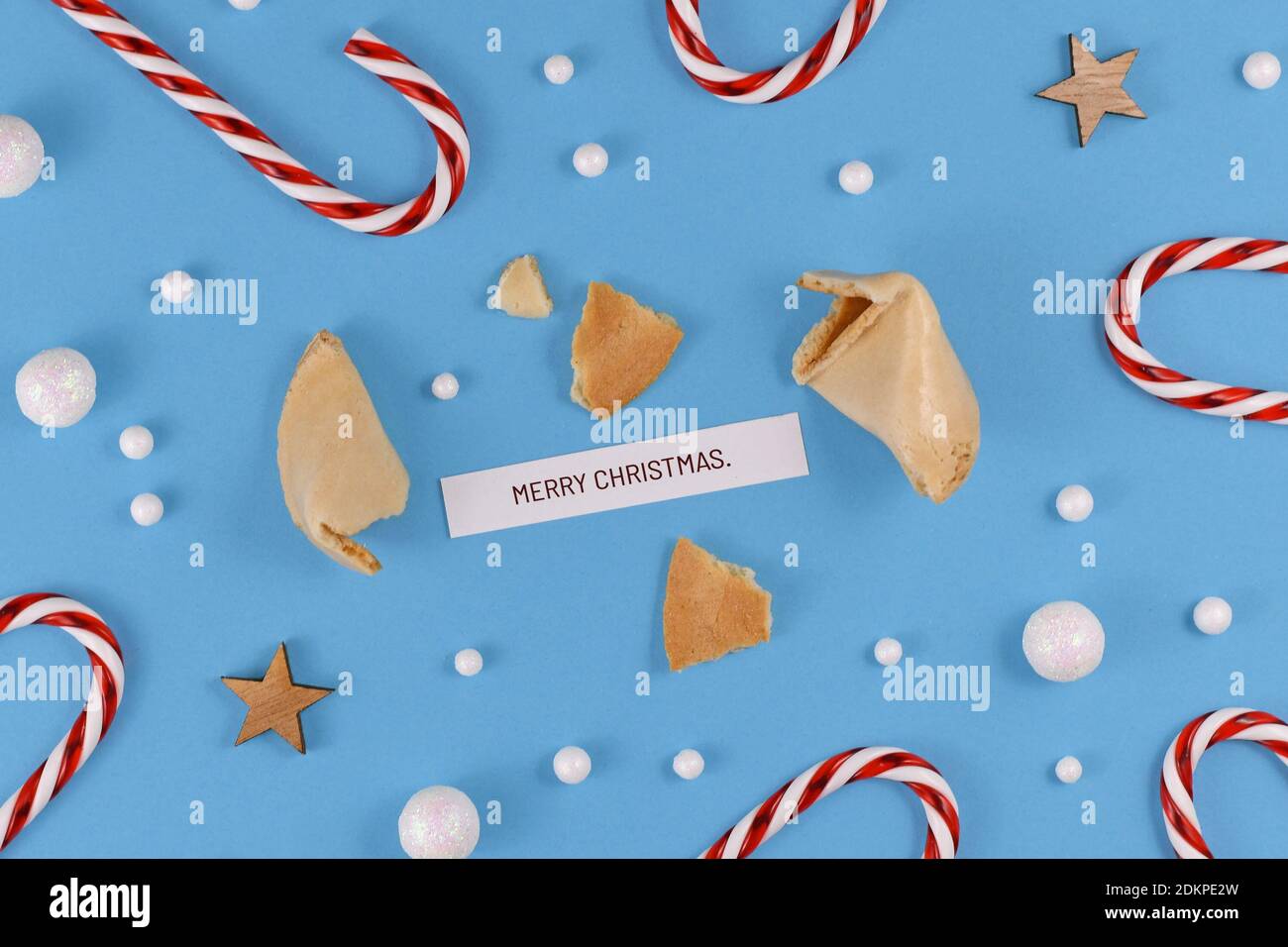 Christmas greetings with open fortune cookie and text 'Merry Christmas ...