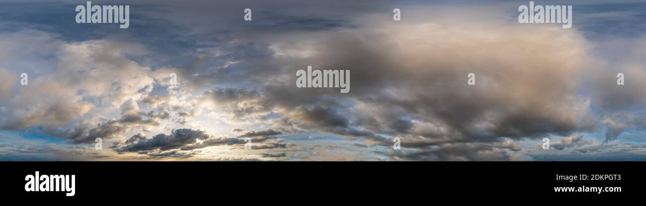Seamless sky panorama on sunset with multi layered clouds in spherical ...