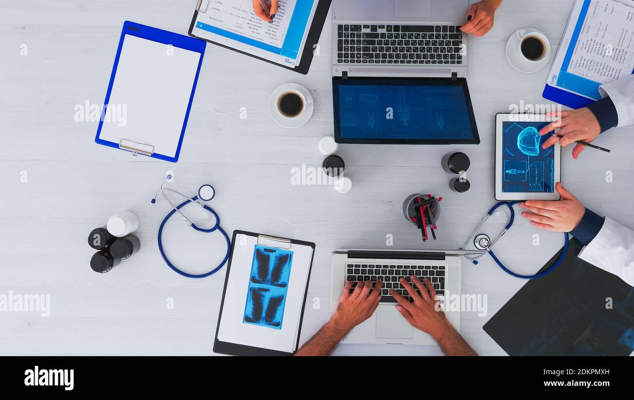 Top view doctor explaining resident hi-res stock photography and images ...