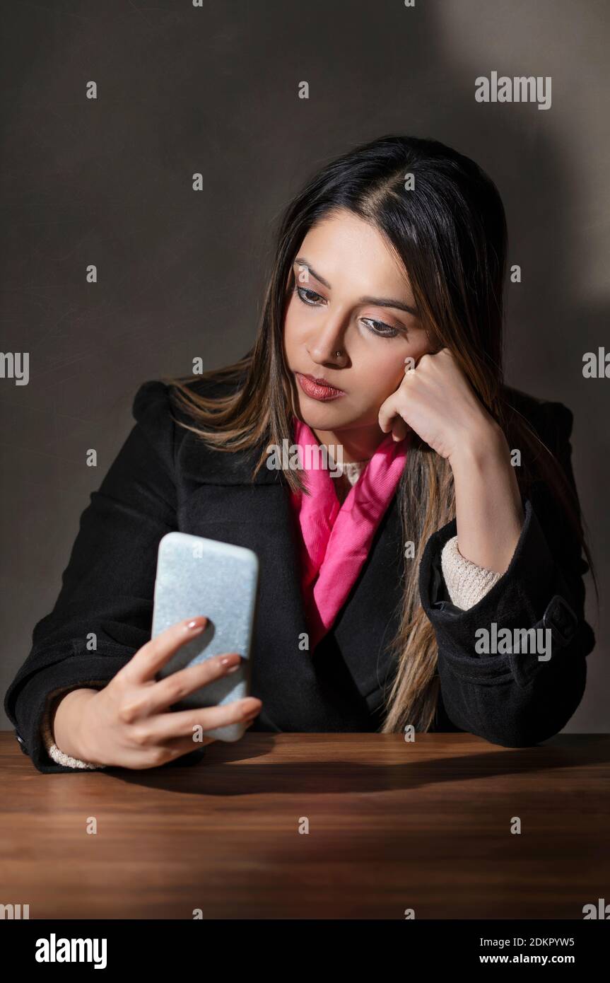 Woman sitting at desk cold hi-res stock photography and images - Alamy