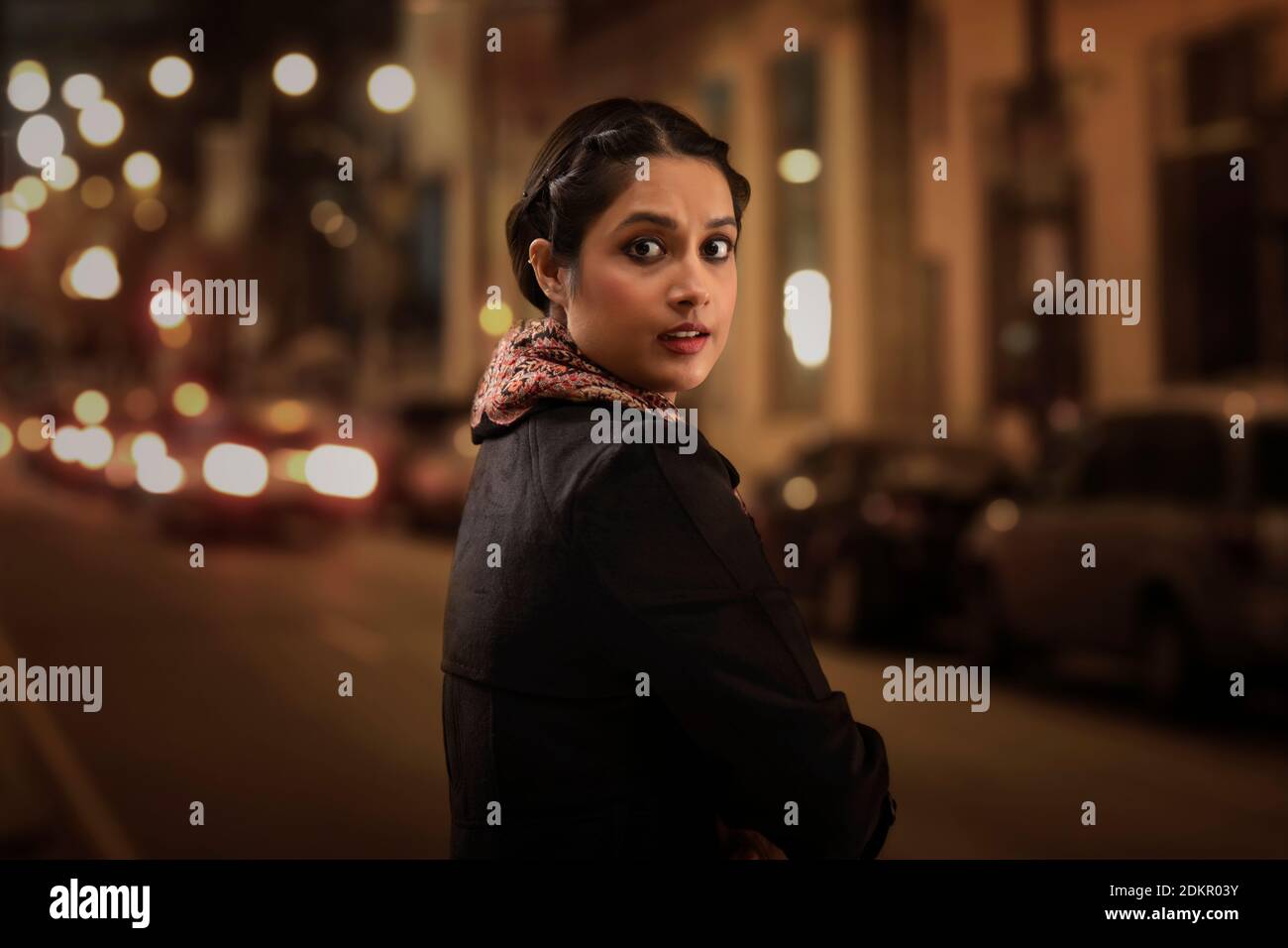 Woman walking on street winter hi-res stock photography and images - Alamy