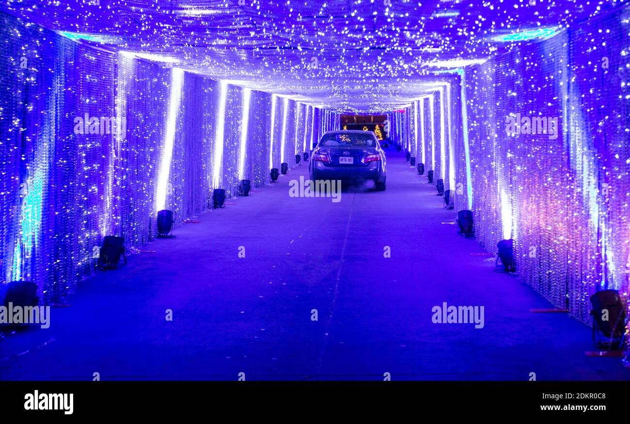 Toronto, Canada. 15th Dec, 2020. Visitors drive their cars to go ...