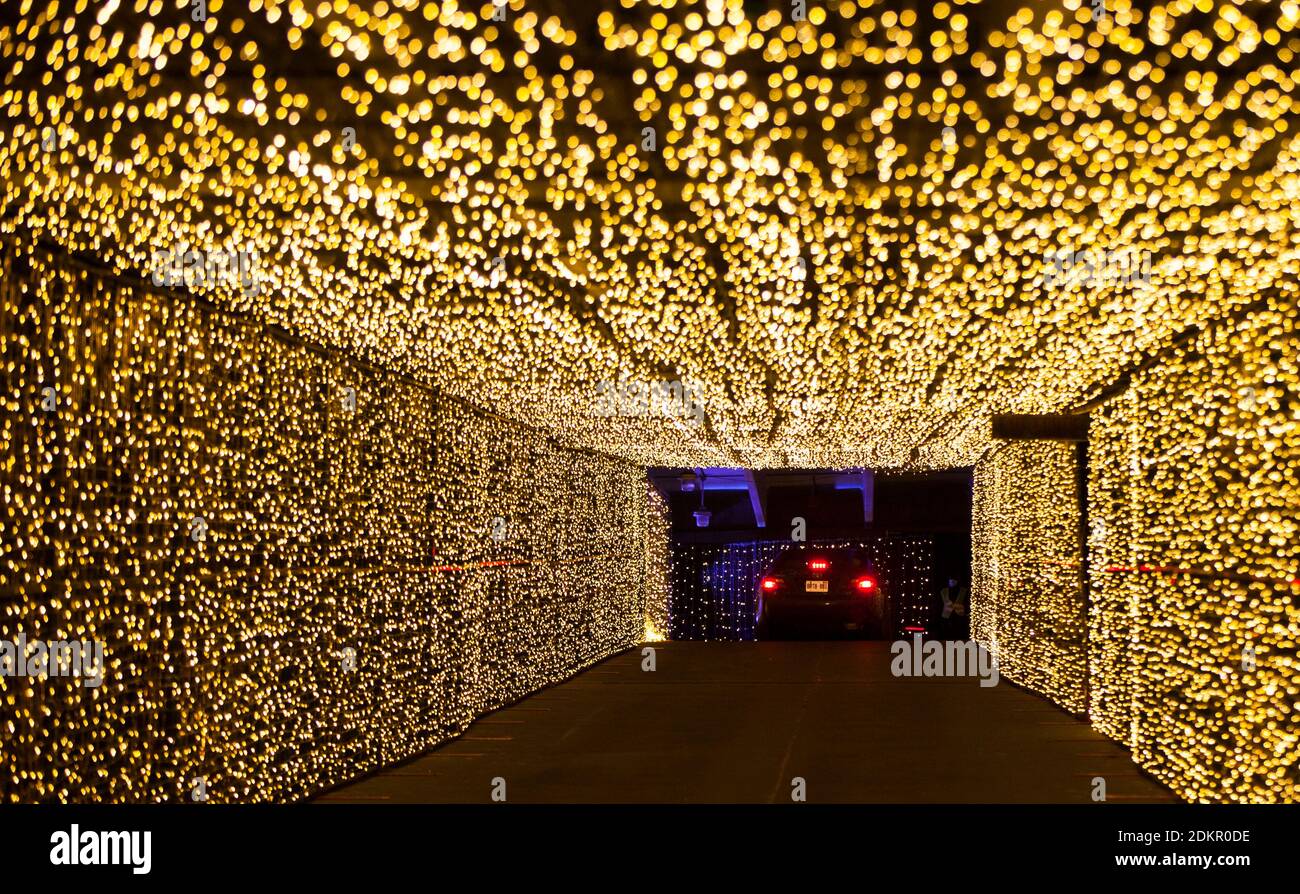 Toronto, Canada. 15th Dec, 2020. Visitors drive their cars to go ...