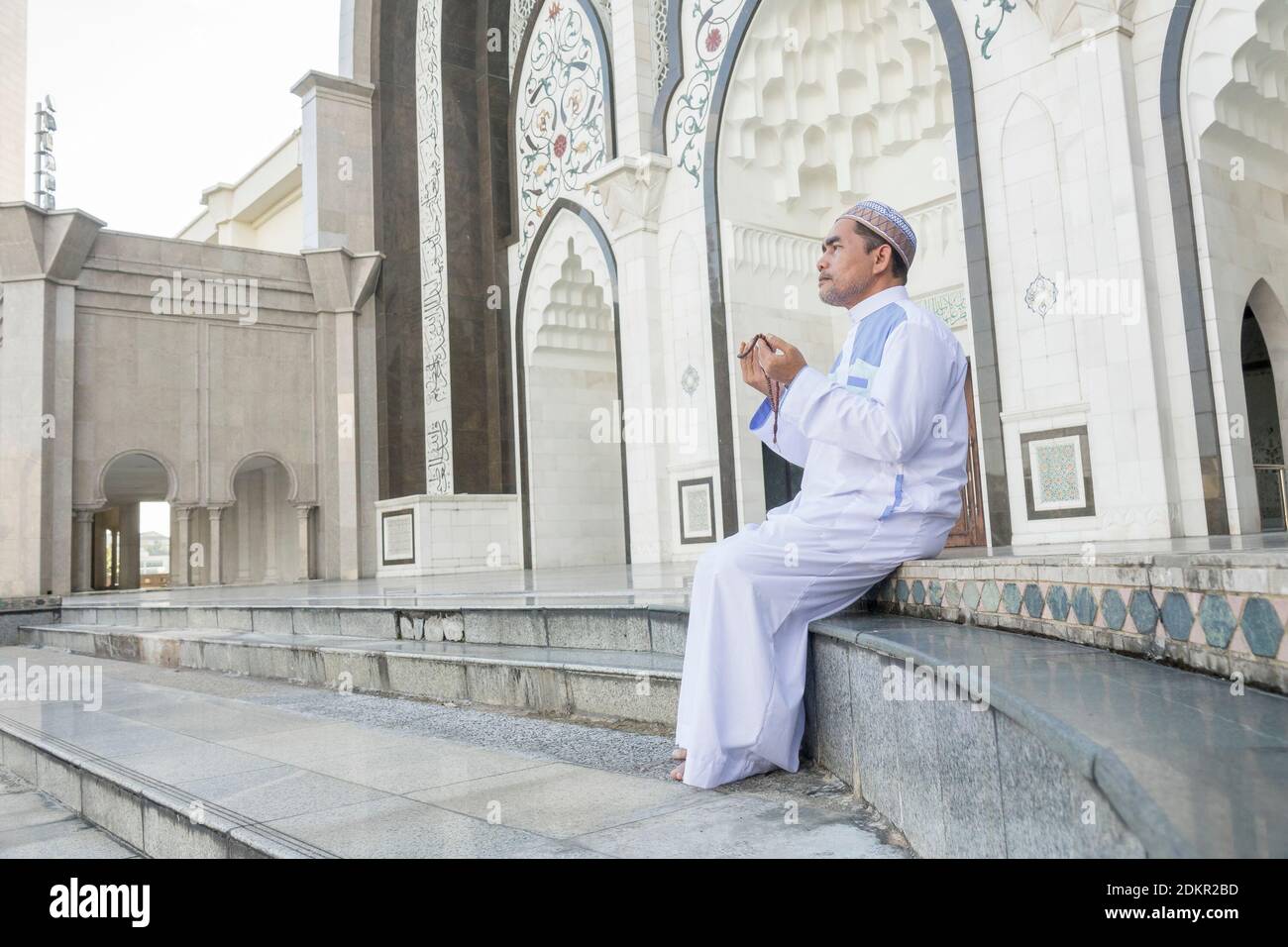 Mature men sitting side side steps hi-res stock photography and images ...