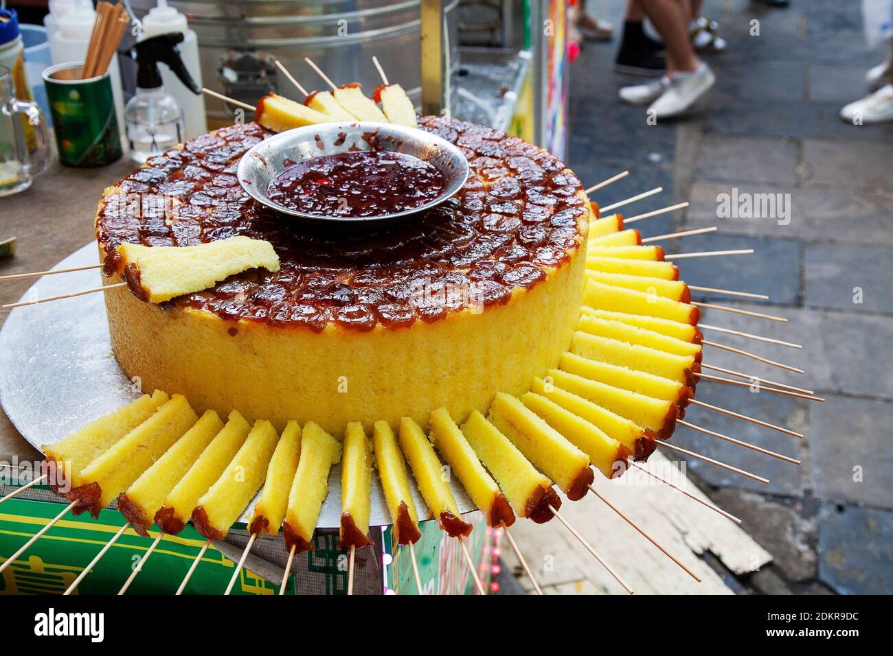 Honey rice cake for sale at street food vendor in Muslim Quarter Xian ...