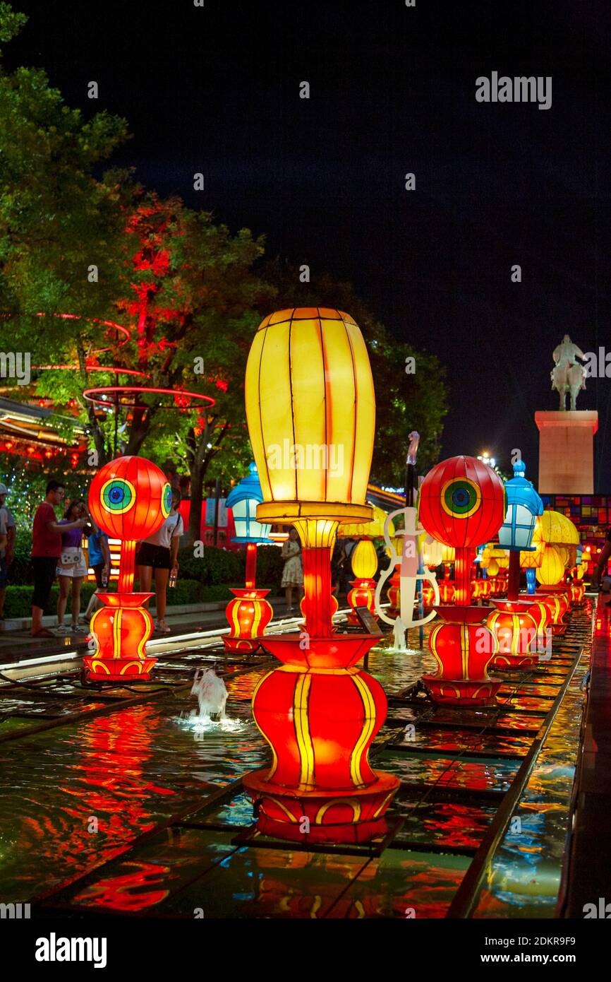 Colourful light sculptures lit in evening at Xian Park Xi'an Night ...