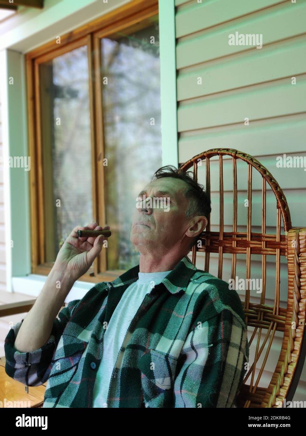 Sitting On Chair And Smoking High Resolution Stock Photography and ...