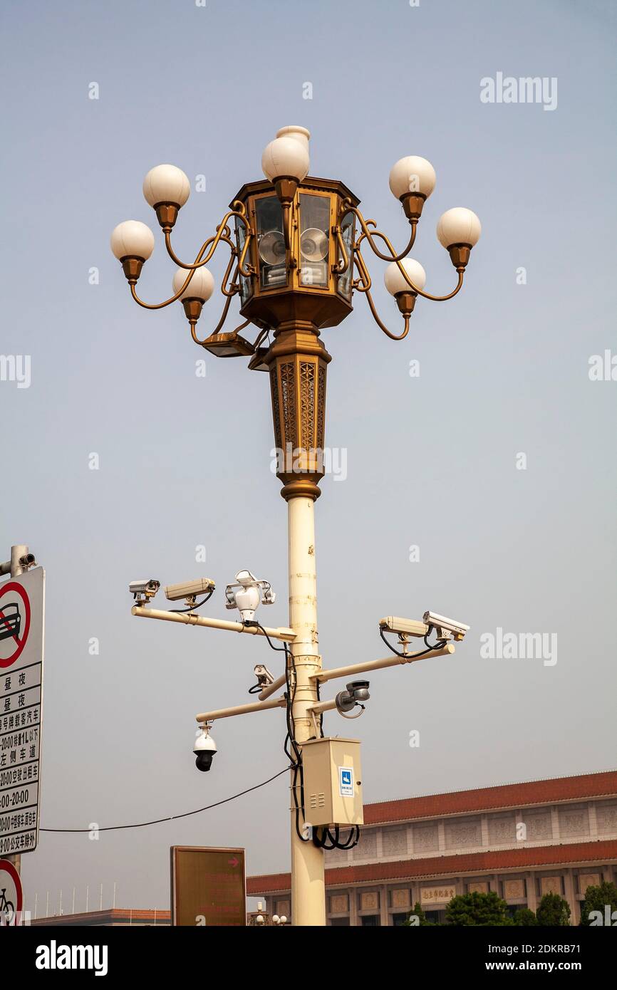 Ornate lamp post with security cameras and speakers in Tiananmen Square ...