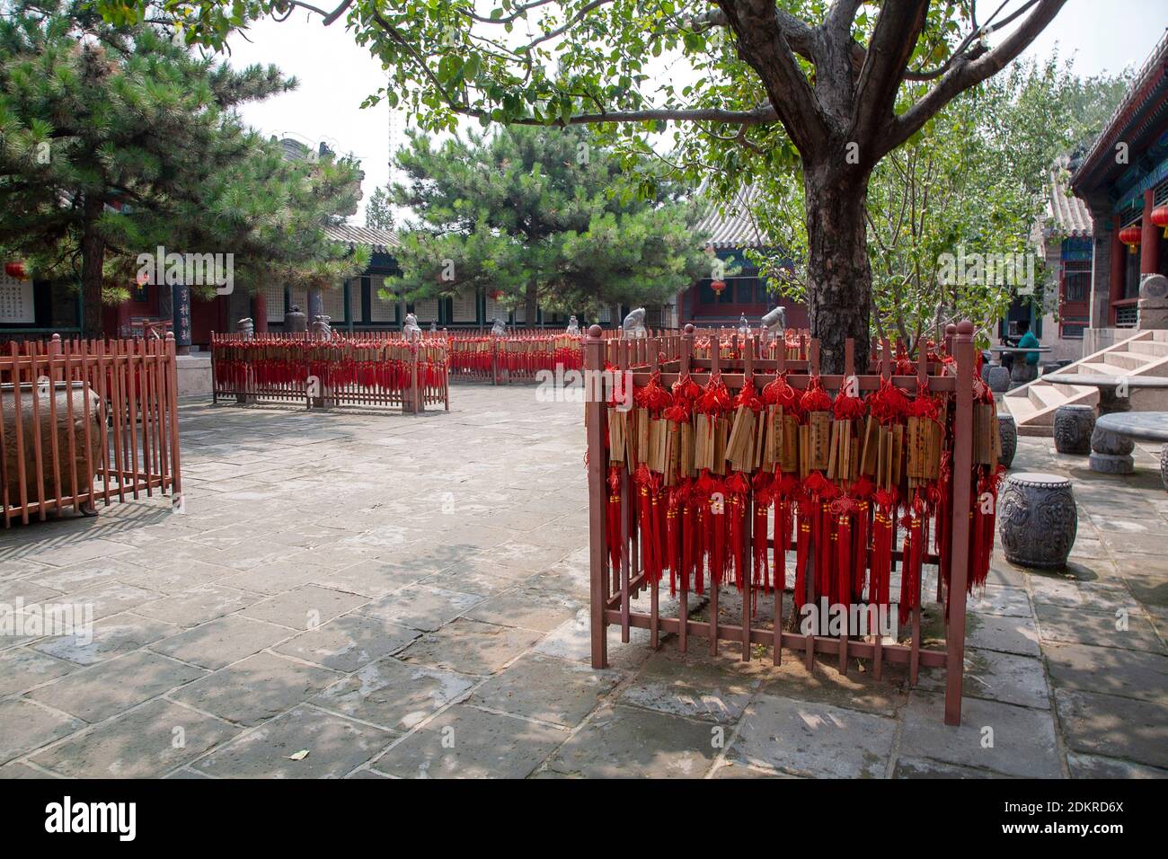 Red Chinese prayer sticks in rest garden near Great Wall of China ...