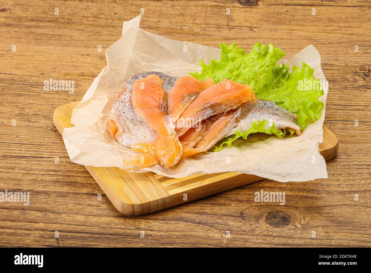 Sliced natural wild trout fillet over board Stock Photo - Alamy