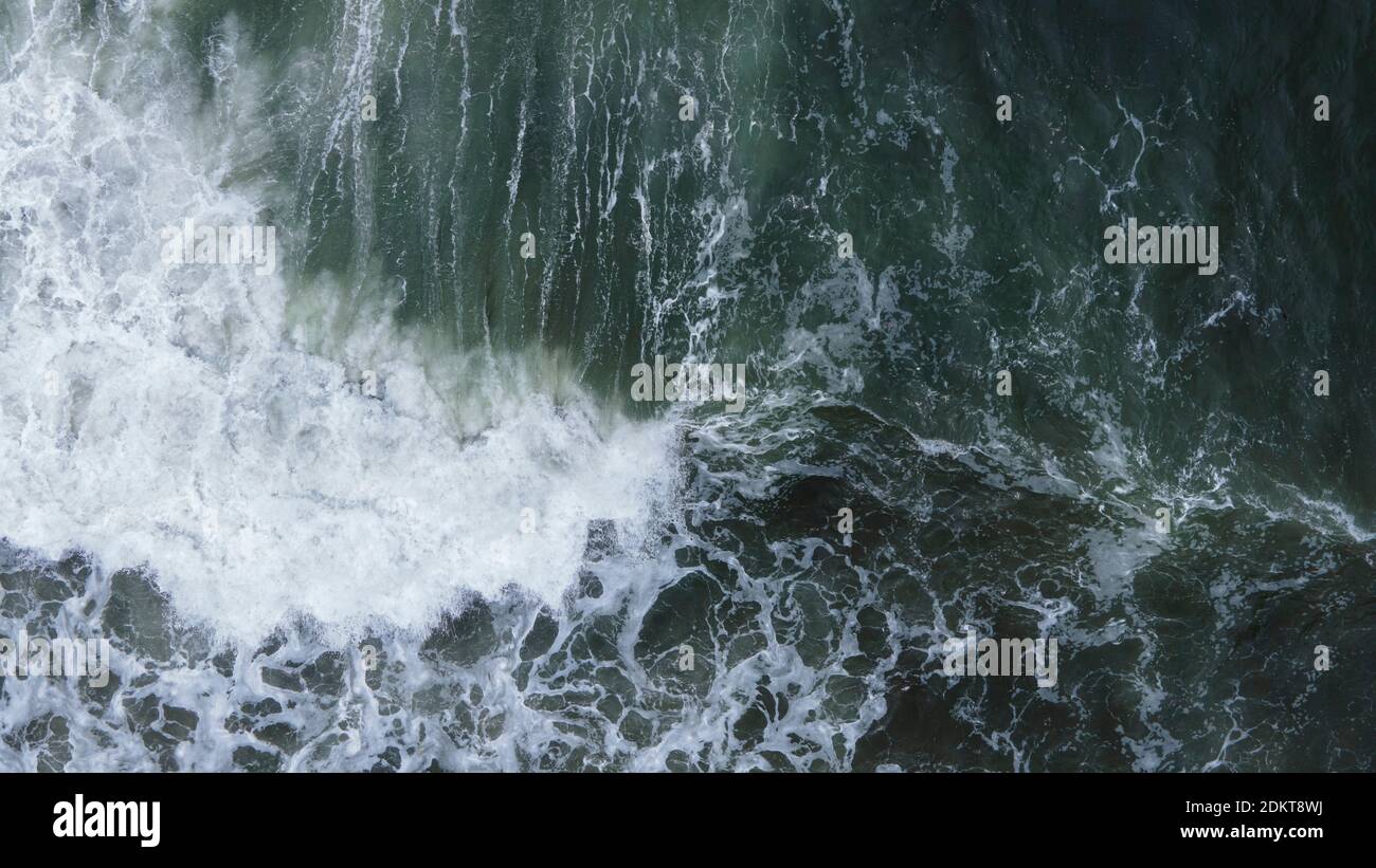 Beautiful scenic aerial landscape of splashing ocean waves with foam ...