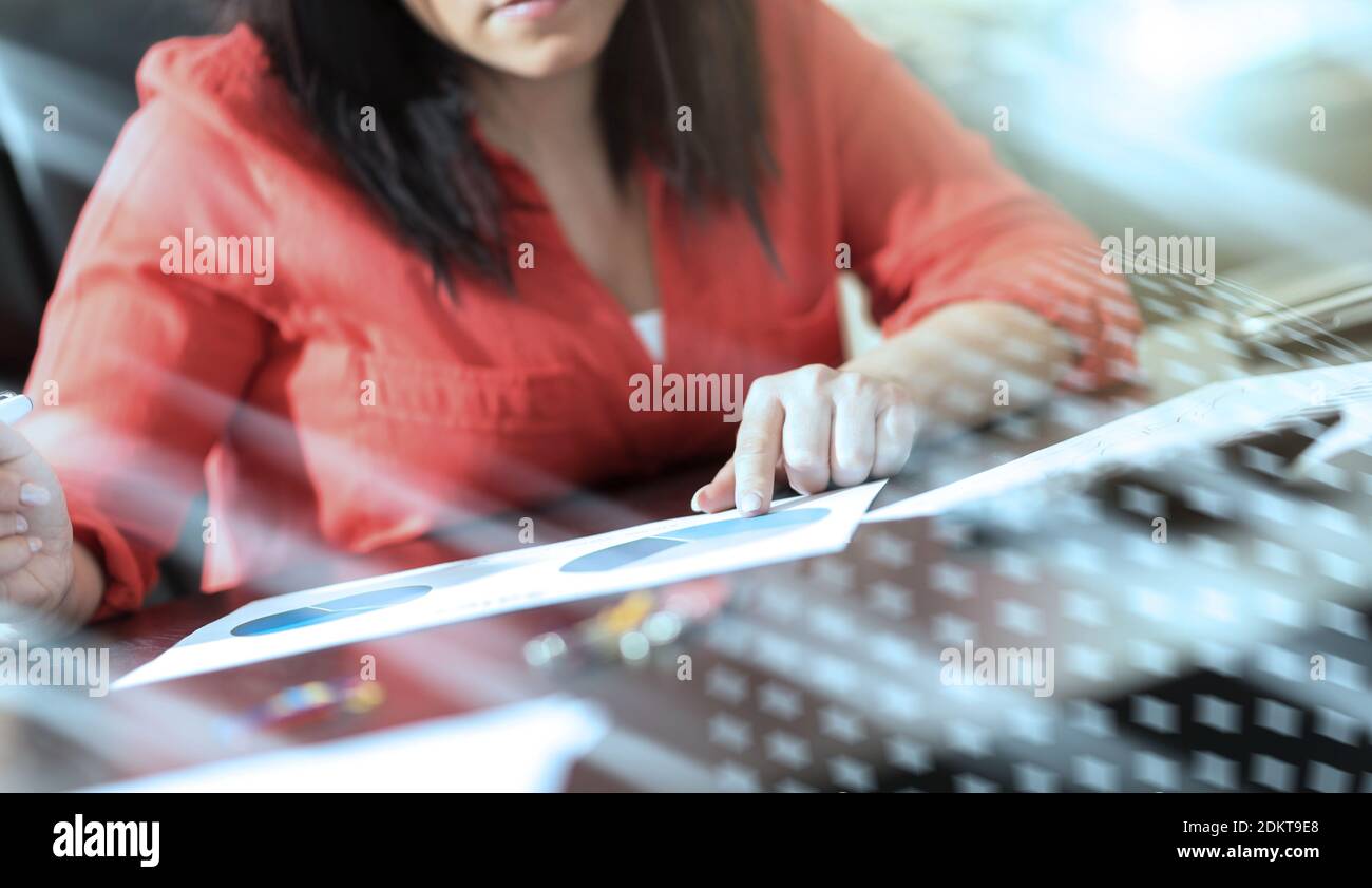 Young businesswoman working on documents at office, light effect Stock ...