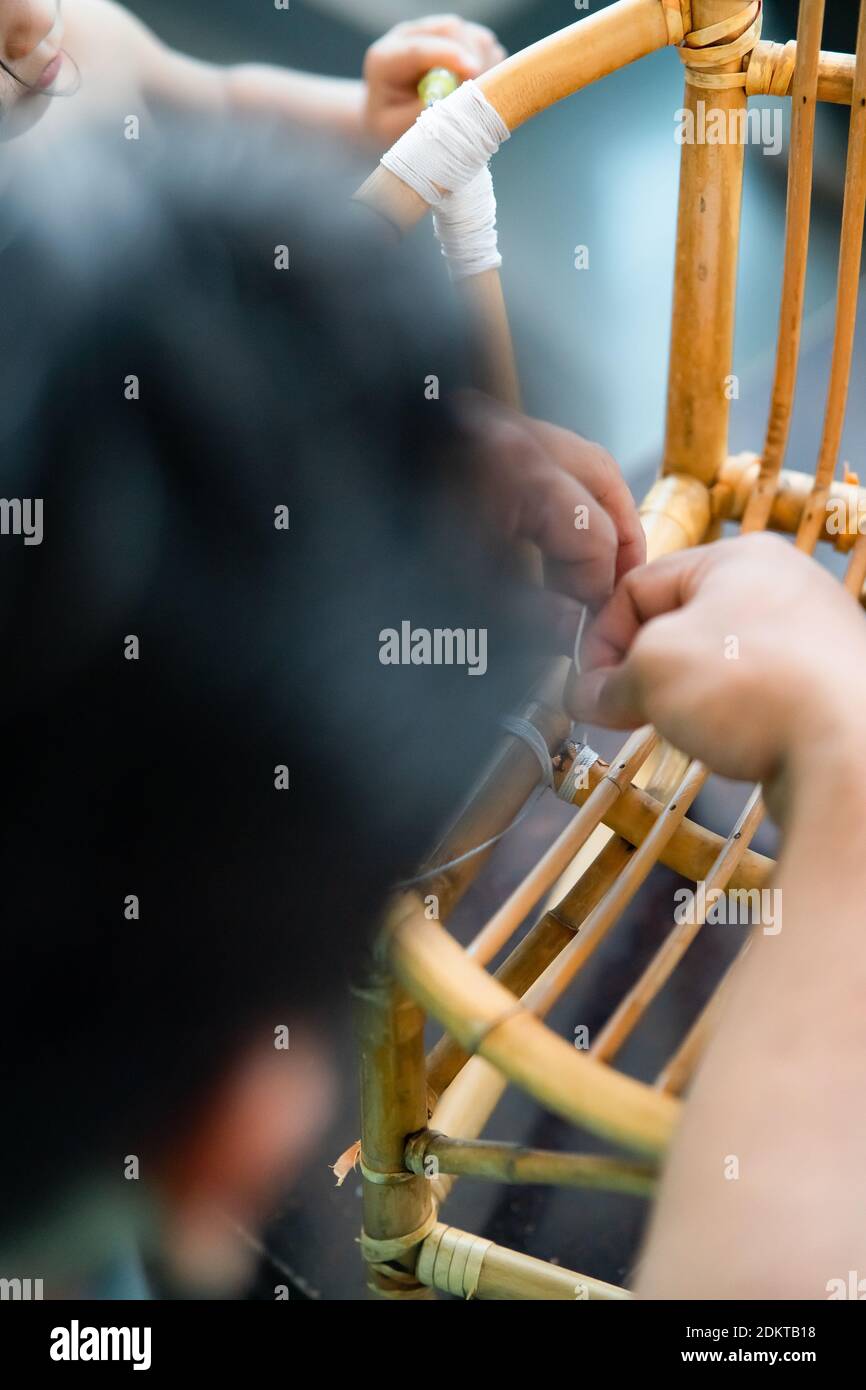 Person bamboo chair hi-res stock photography and images - Alamy