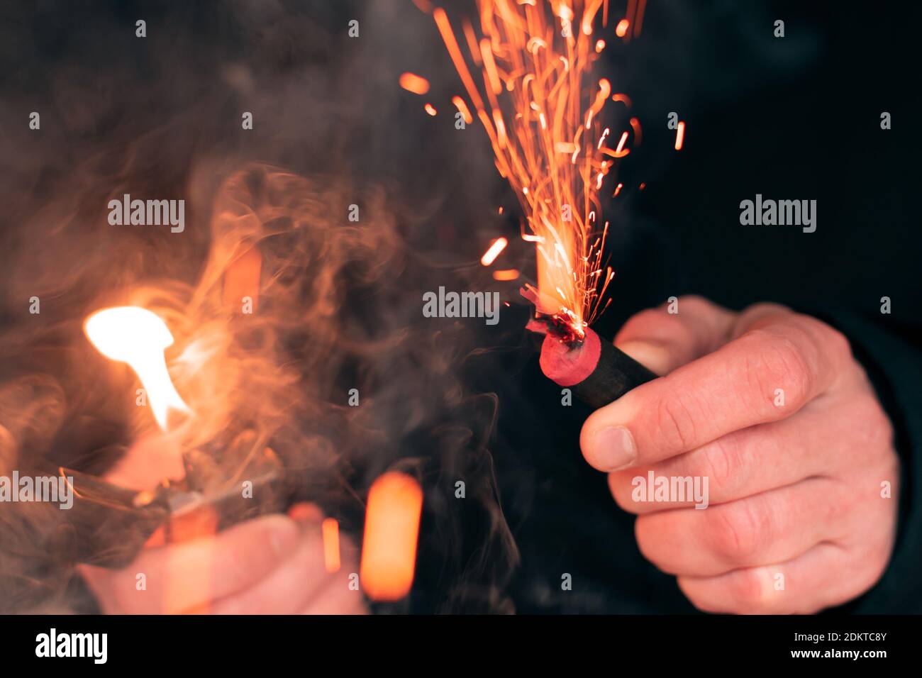 The Firecracker in a Hand. Man Holding a Burning Petard in His Hand. A ...