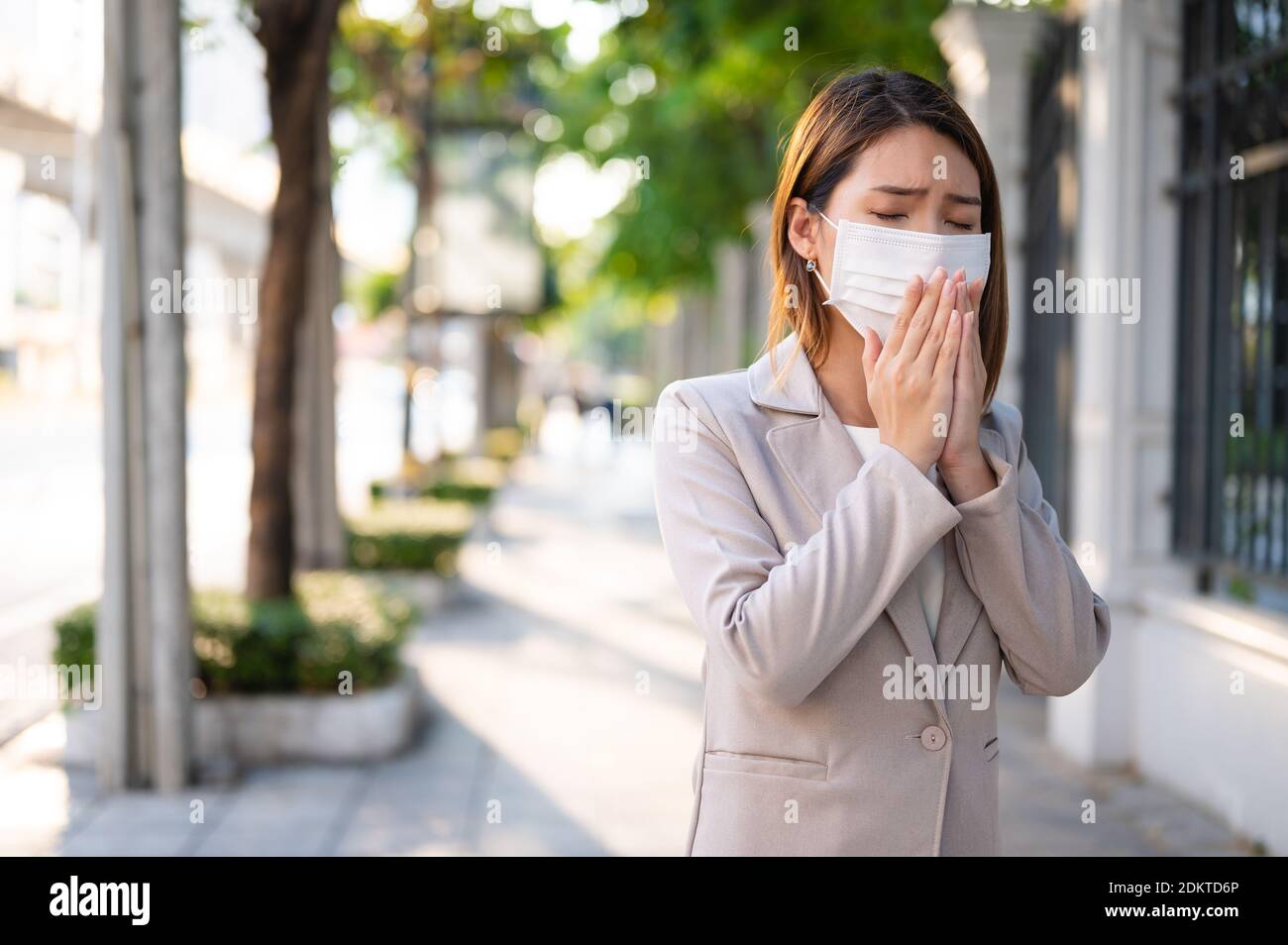 Covering Nose High Resolution Stock Photography and Images - Alamy