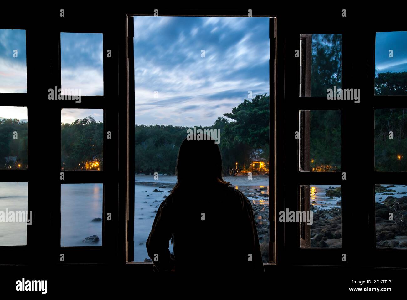 Women window lake hi-res stock photography and images - Alamy