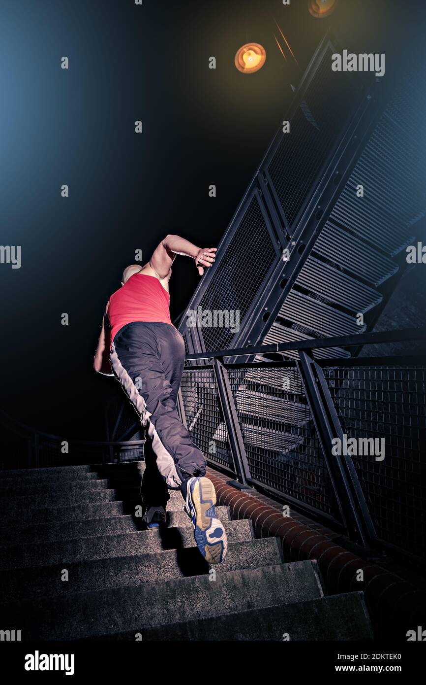 Men running danger night hi-res stock photography and images - Alamy