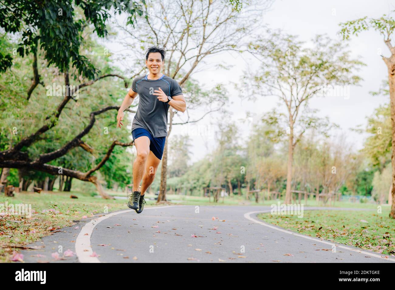 Indian man running in park hi-res stock photography and images - Alamy