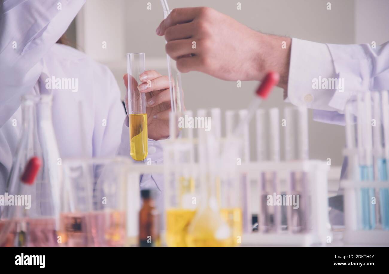 Hand holding two test tubes High Resolution Stock Photography and ...