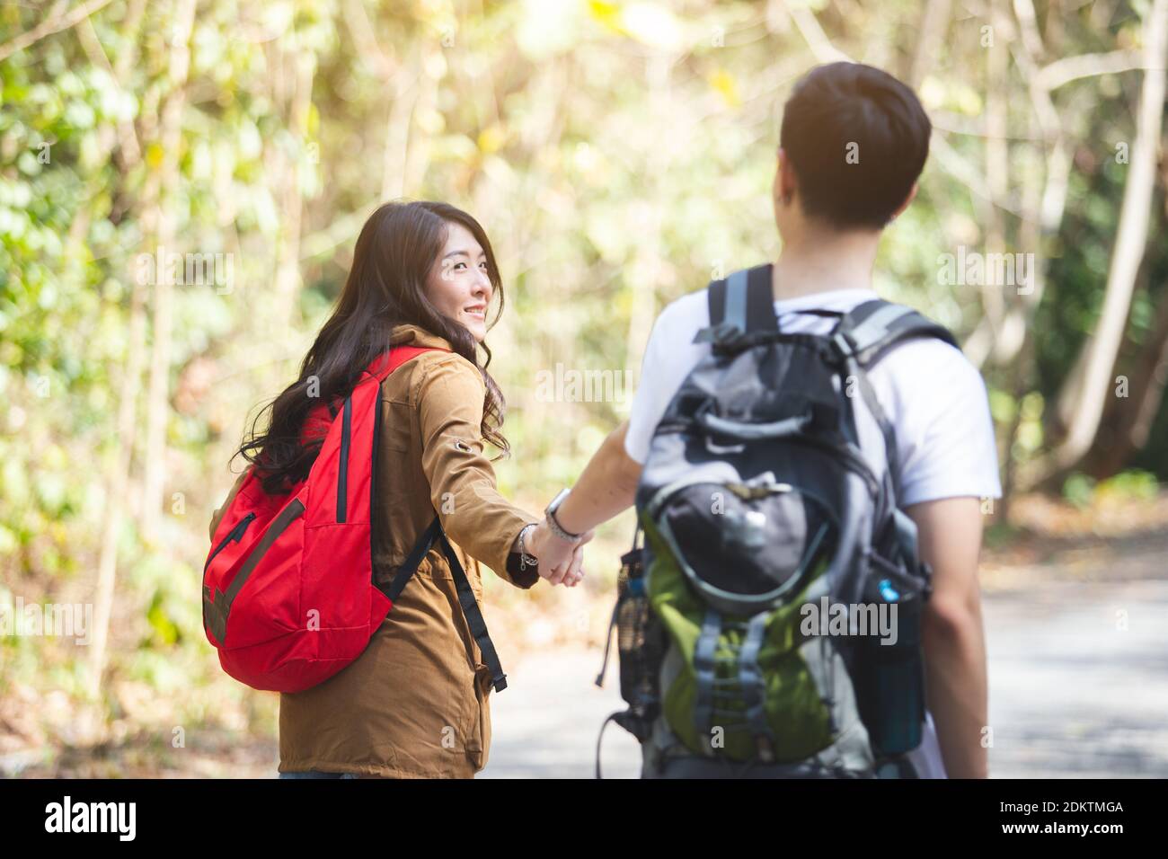 Back view standing woman pulling hi-res stock photography and images ...