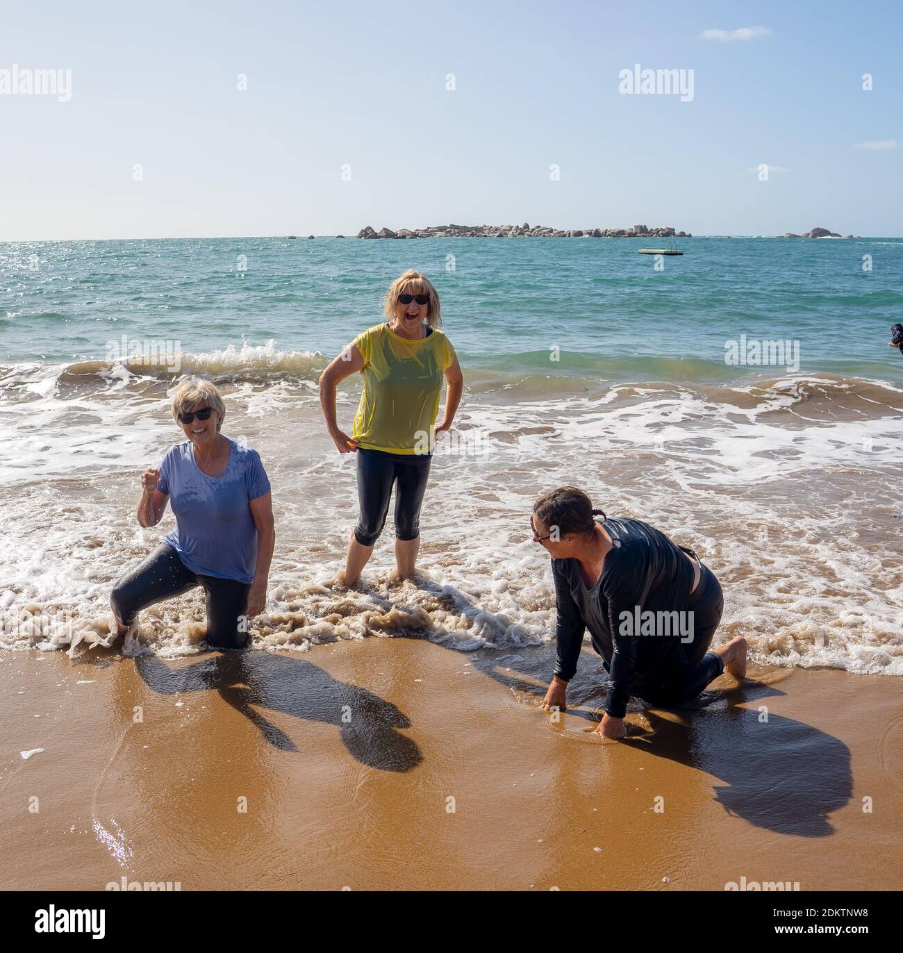 Group of senior retired women on their 60s and 70s falling in the water ...