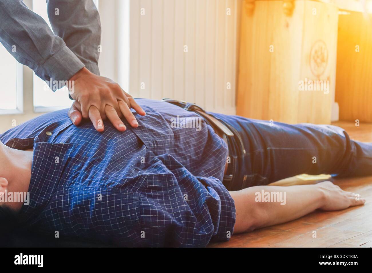Lifeguard performing cpr hi-res stock photography and images - Alamy
