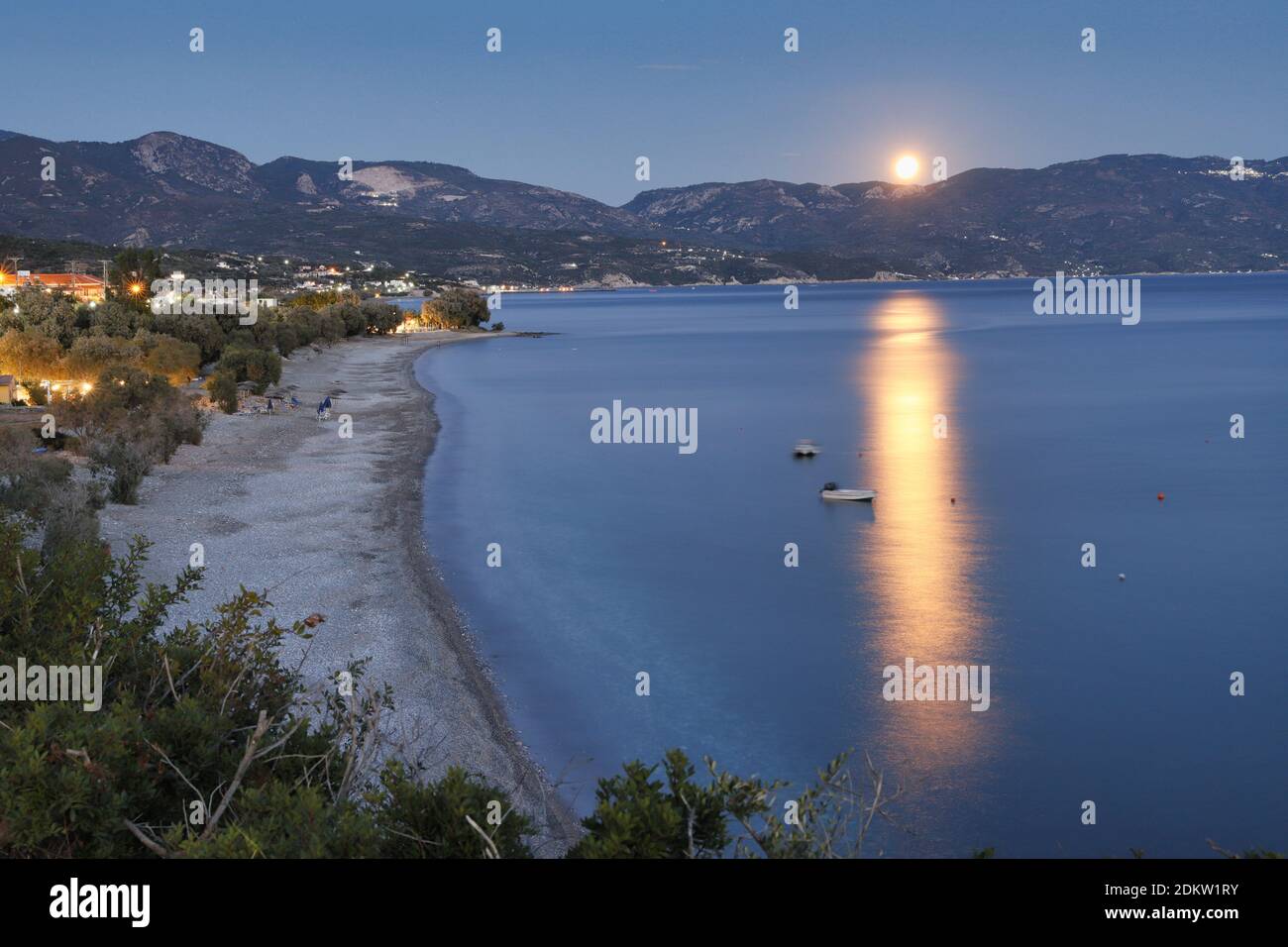 Moon rise over the Bay of Marathokambos on the Greek island of Samos ...