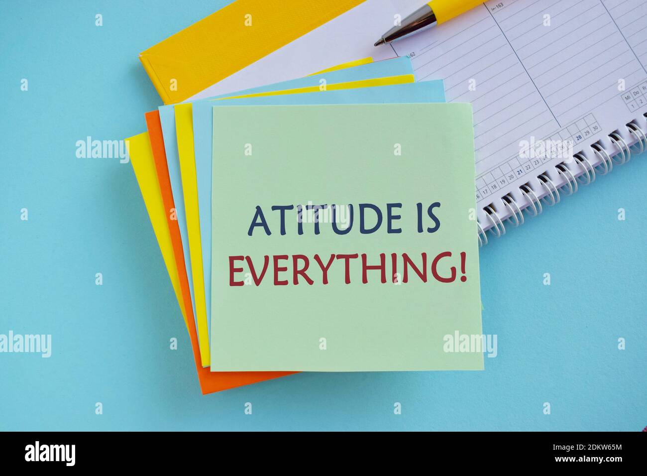 Attitude is Everything concept text on colorful note.Writing note ...