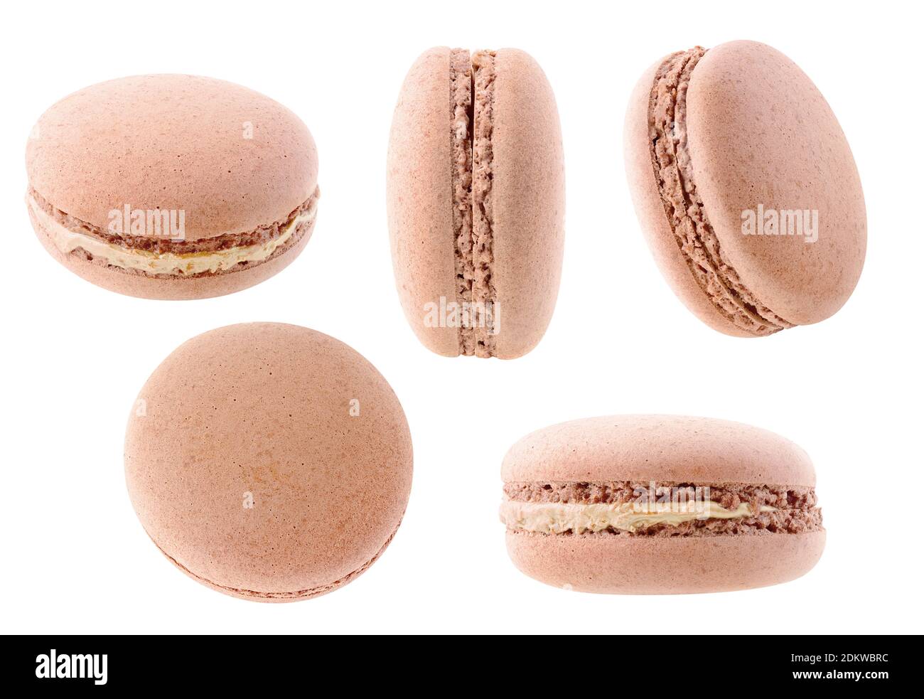 Isolated light brown macarons. Collection of coffee macaroons at ...