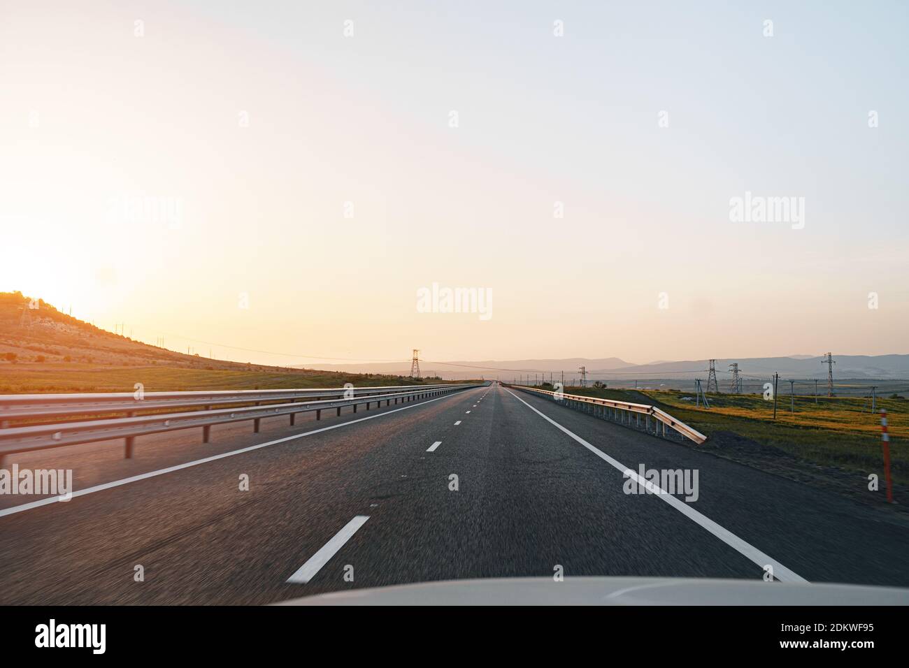 Empty highway at dawn, view from driver's perspective Stock Photo - Alamy